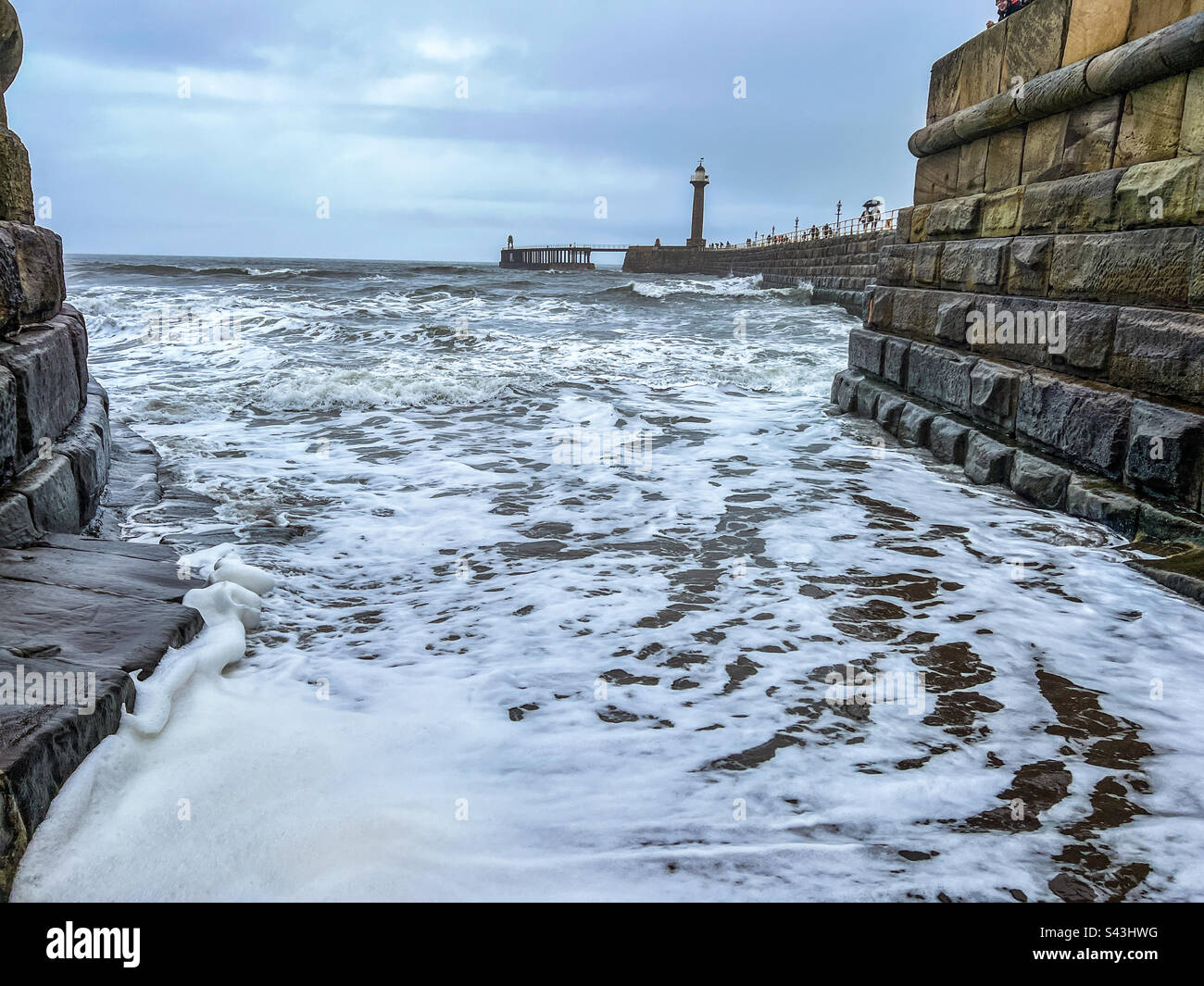 North Sea at Whitby harbour and pier Stock Photo - Alamy