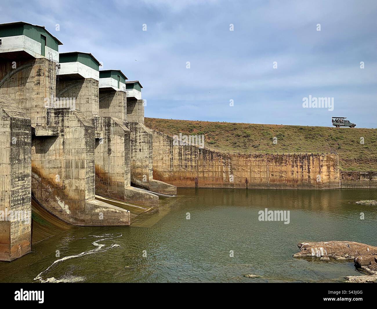 Lake view with a jeep Stock Photo - Alamy
