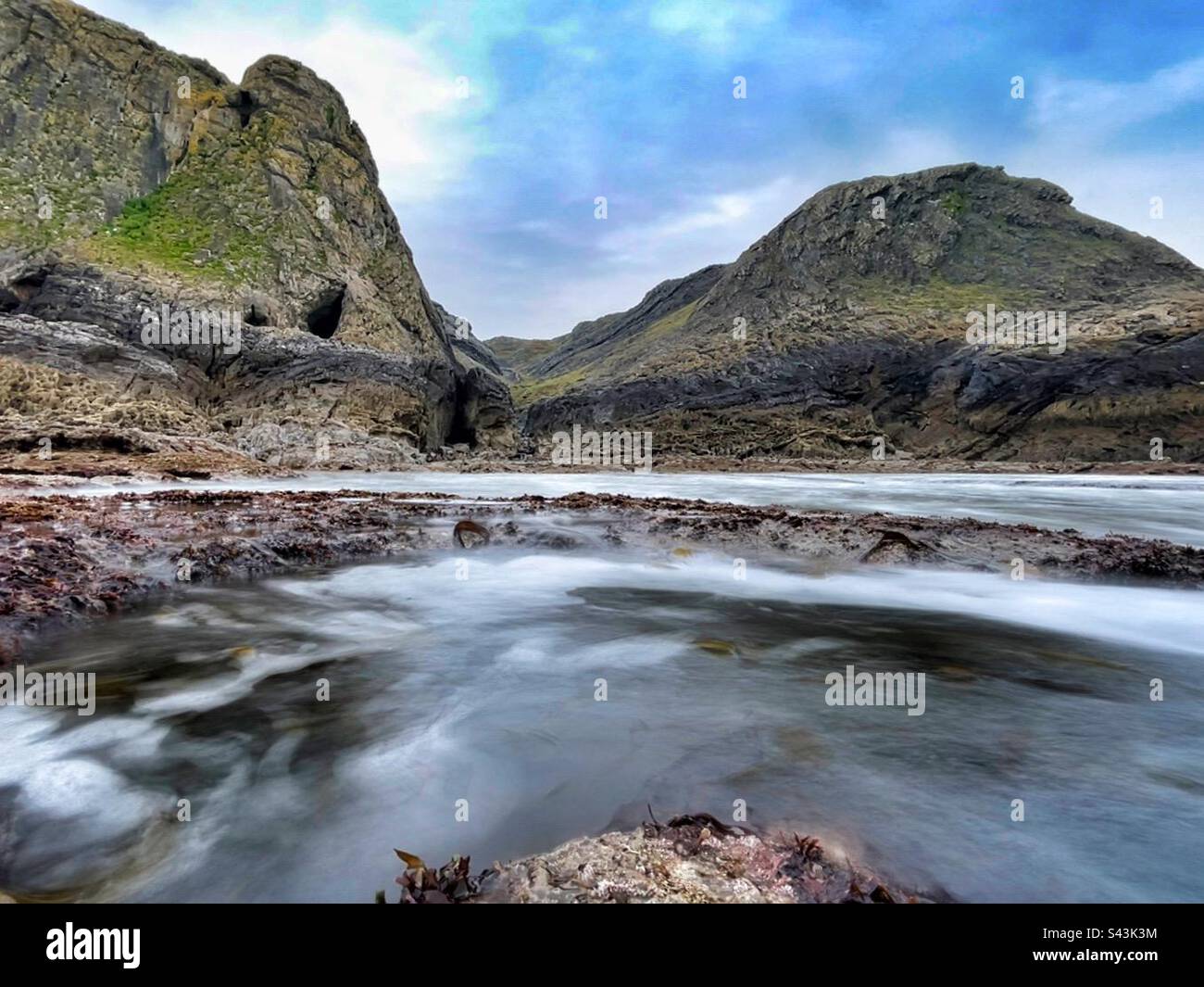 The coastline below Paviland Cave (Goat's Hole Cave) on the South Gower ...