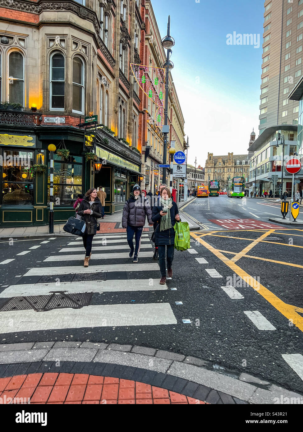 Shopping on Boar Lane in Leeds City Centre Stock Photo - Alamy