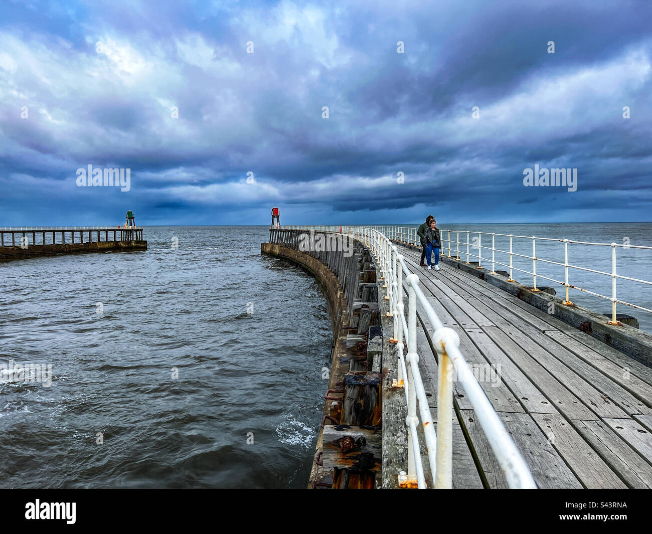 Whitby harbour pier Stock Photo - Alamy