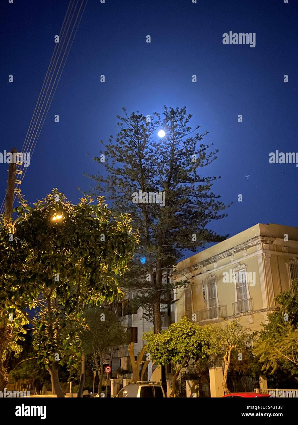 Full moon from a distance Stock Photo - Alamy