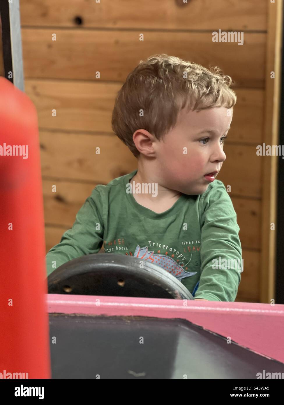 Boy driving tractor hi-res stock photography and images - Alamy