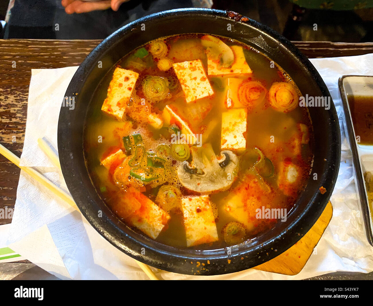 Kimchi Jjigae, a Korean soup made with kimchi and tofu Stock Photo - Alamy