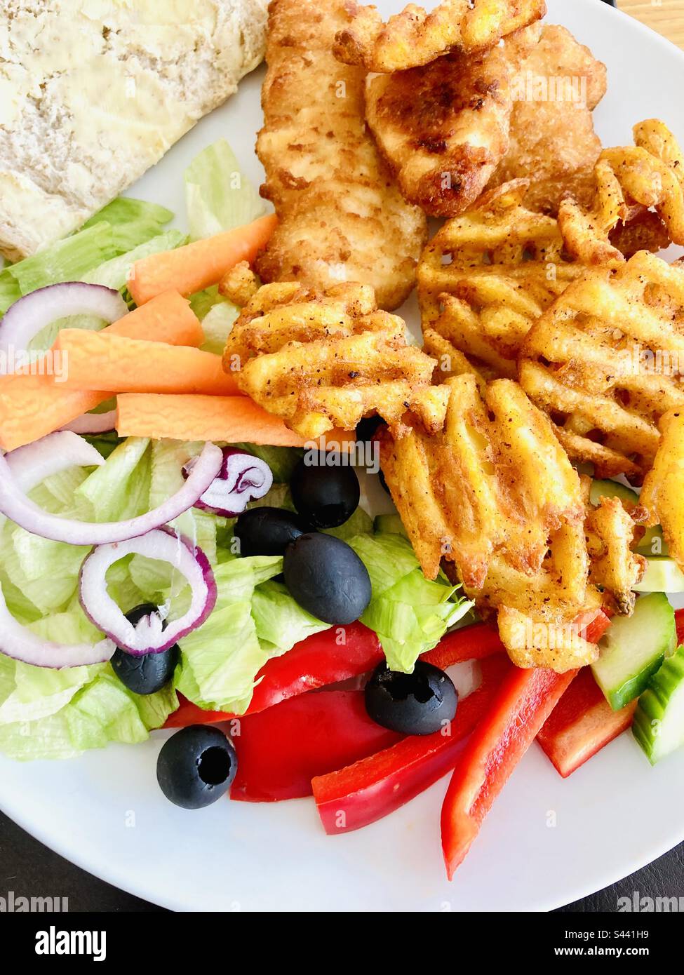 Battered potato slices hi-res stock photography and images - Alamy