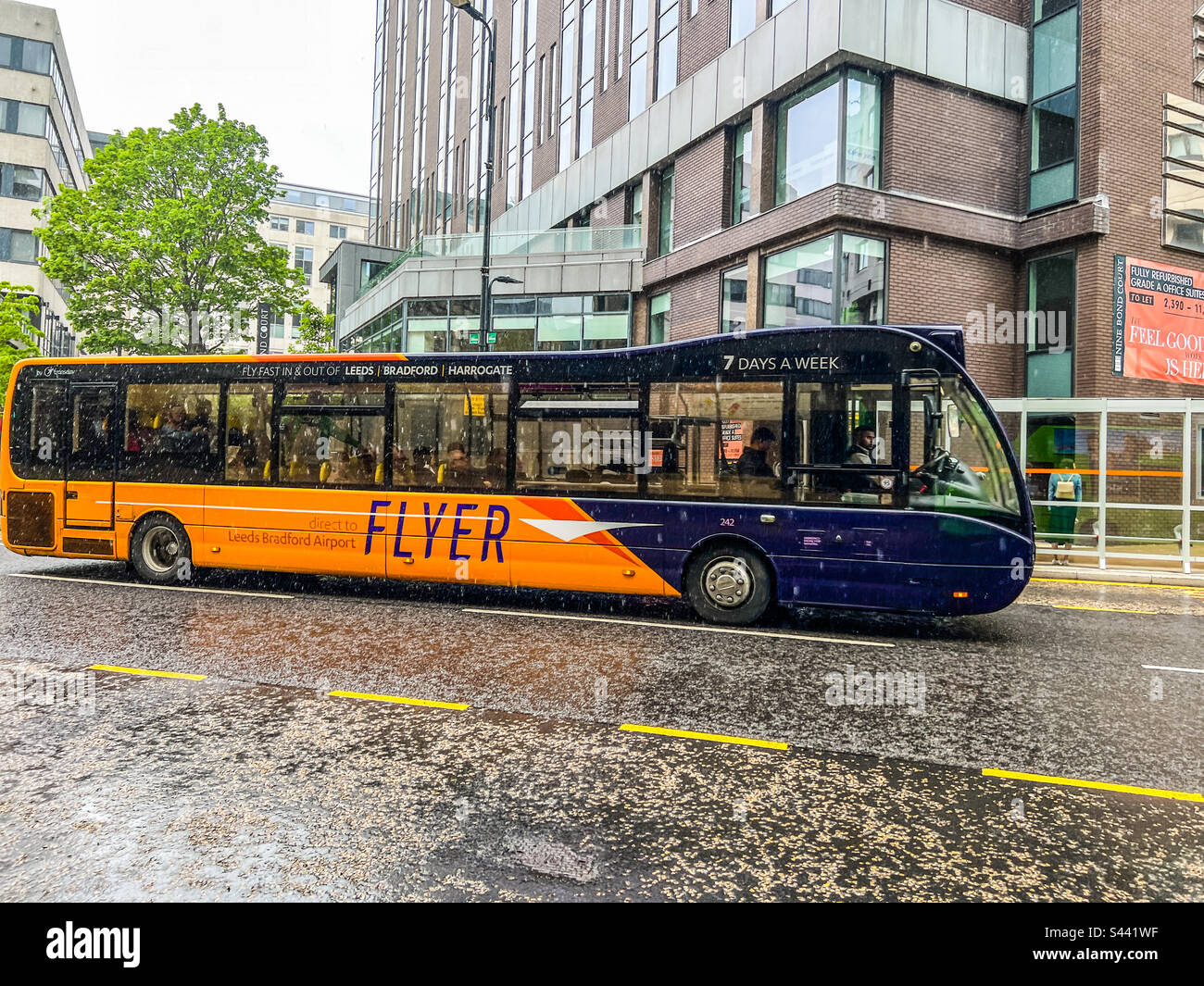 Leeds flyer bus in Leeds city centre Stock Photo - Alamy