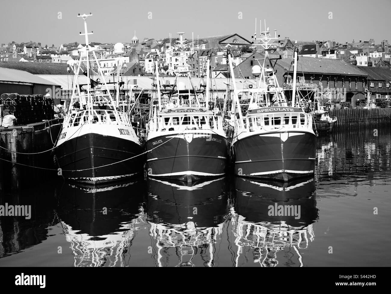Fishing Boats in Harbour Stock Photo - Alamy