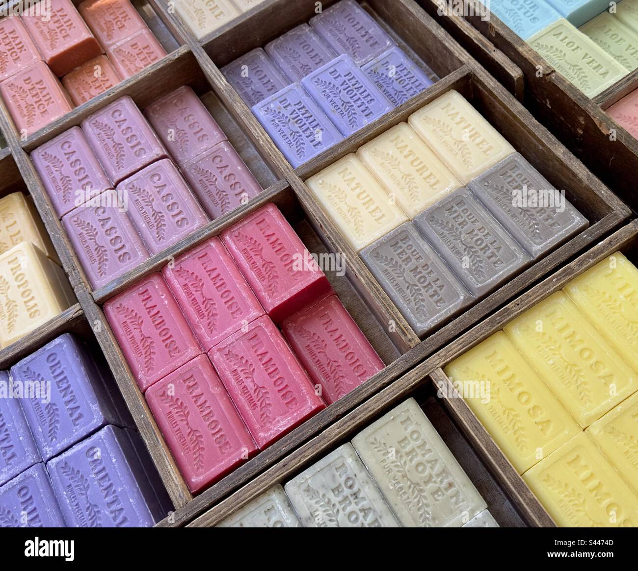 Colourful cakes of soap for sale in a French Street market Stock Photo ...