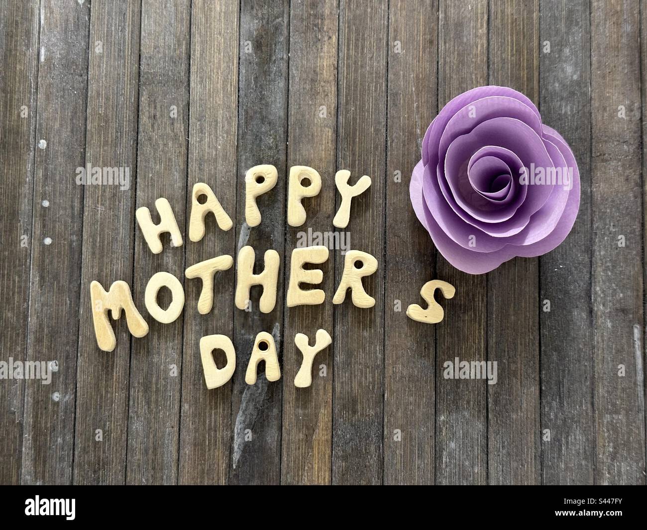 Happy Mother’s Day celebrated with handmade wooden letters and an ...