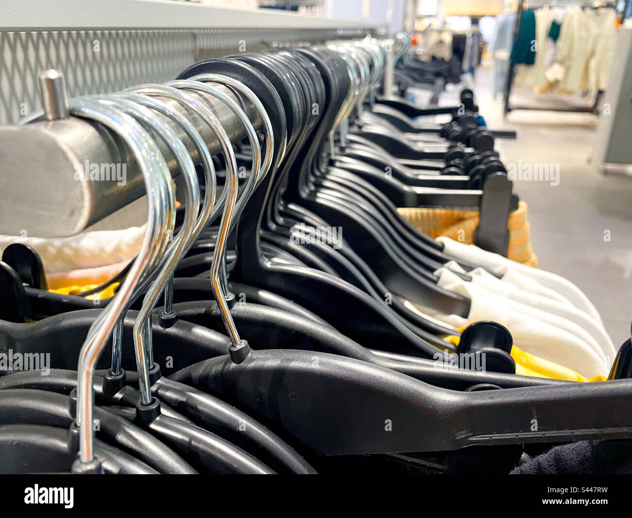 Clothes hung on hangers hi-res stock photography and images - Alamy