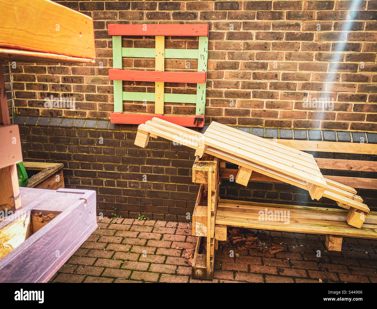 Pallets and Recycled pallets put to good use as a bench and planters ...
