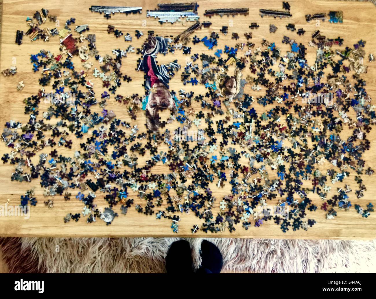 Approaching a very large puzzle, very partially assembled. Hours, days ...