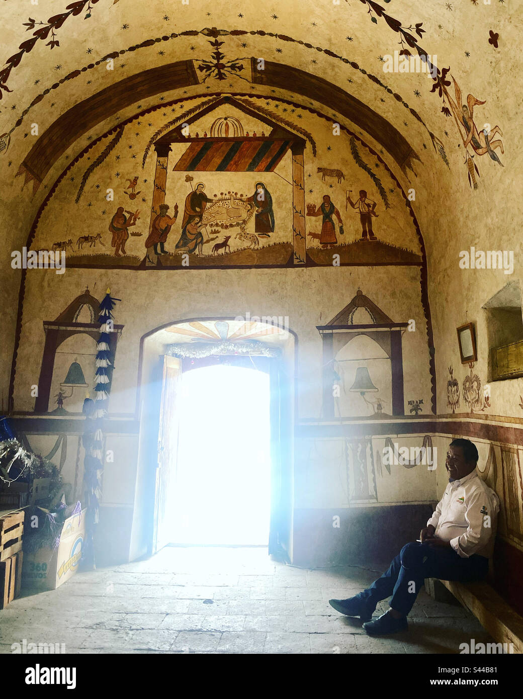 A tourists guide sits inside in the Capilla Oratoria chappel of Los ...