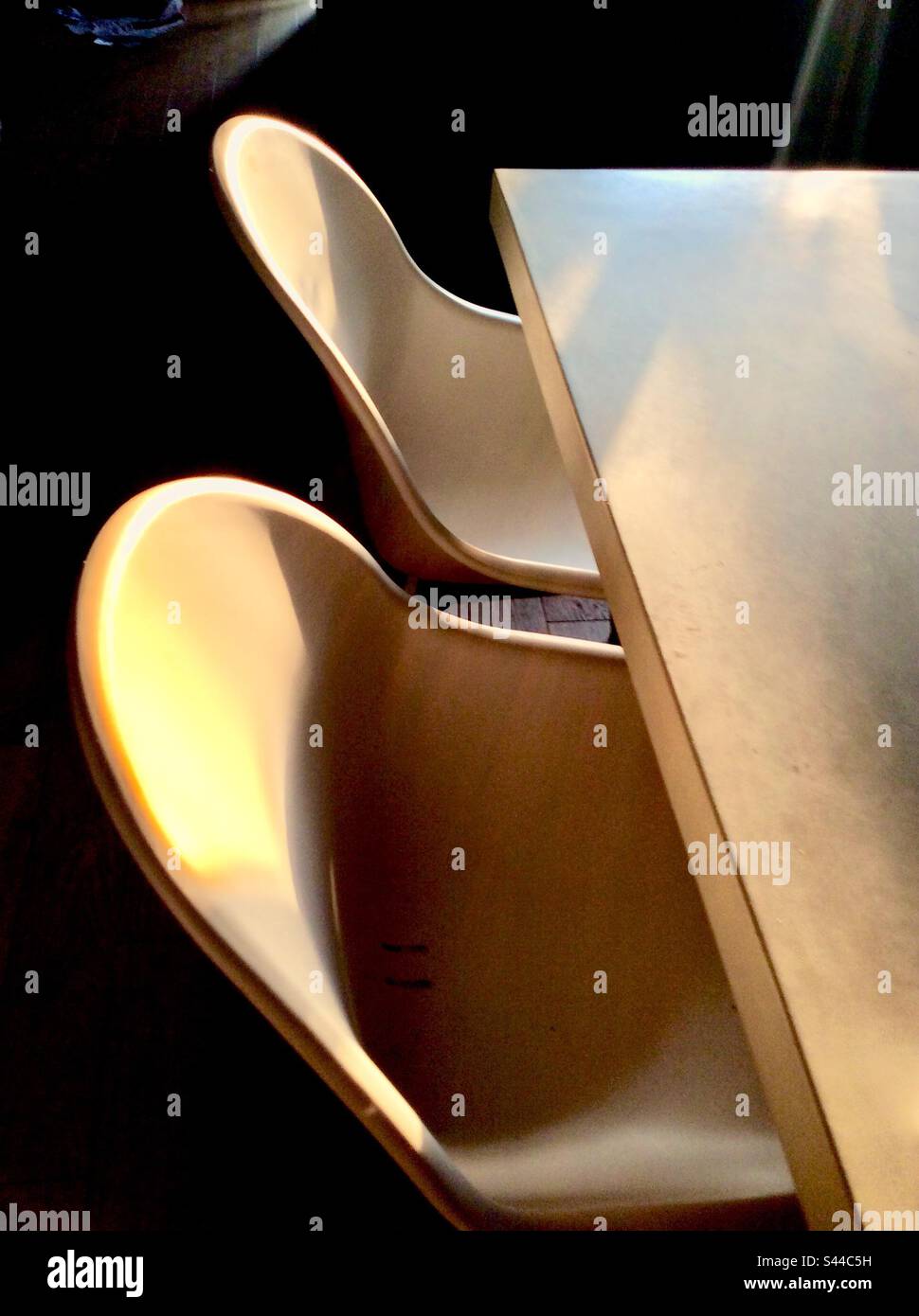 Two chairs and a table, an abstract form for design in contemporary ...