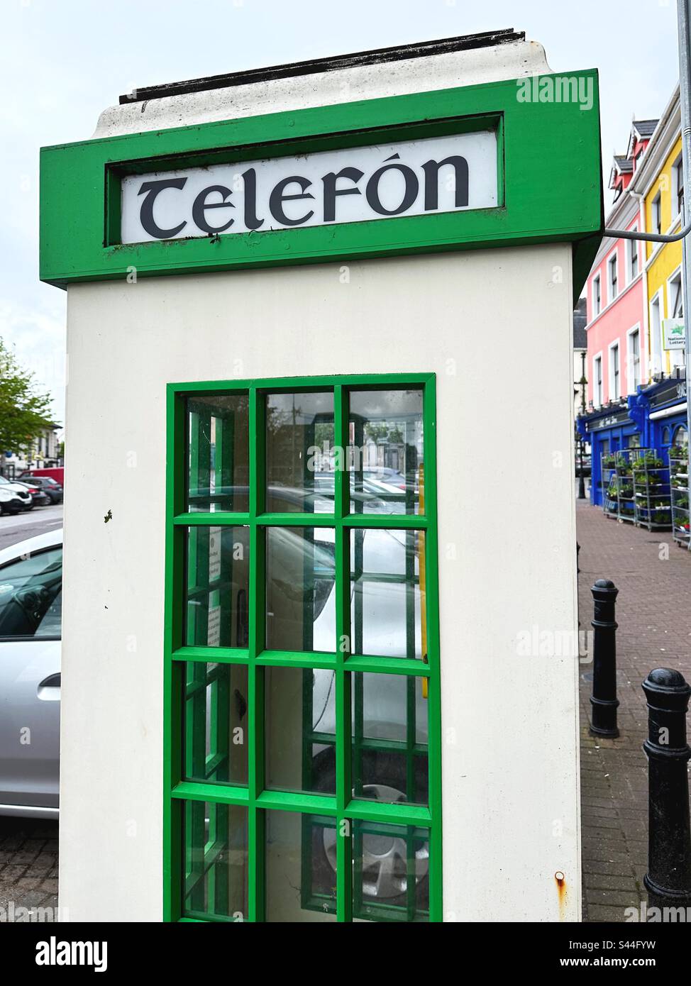 A green and white telephone booth and Cobh, Ireland Stock Photo - Alamy