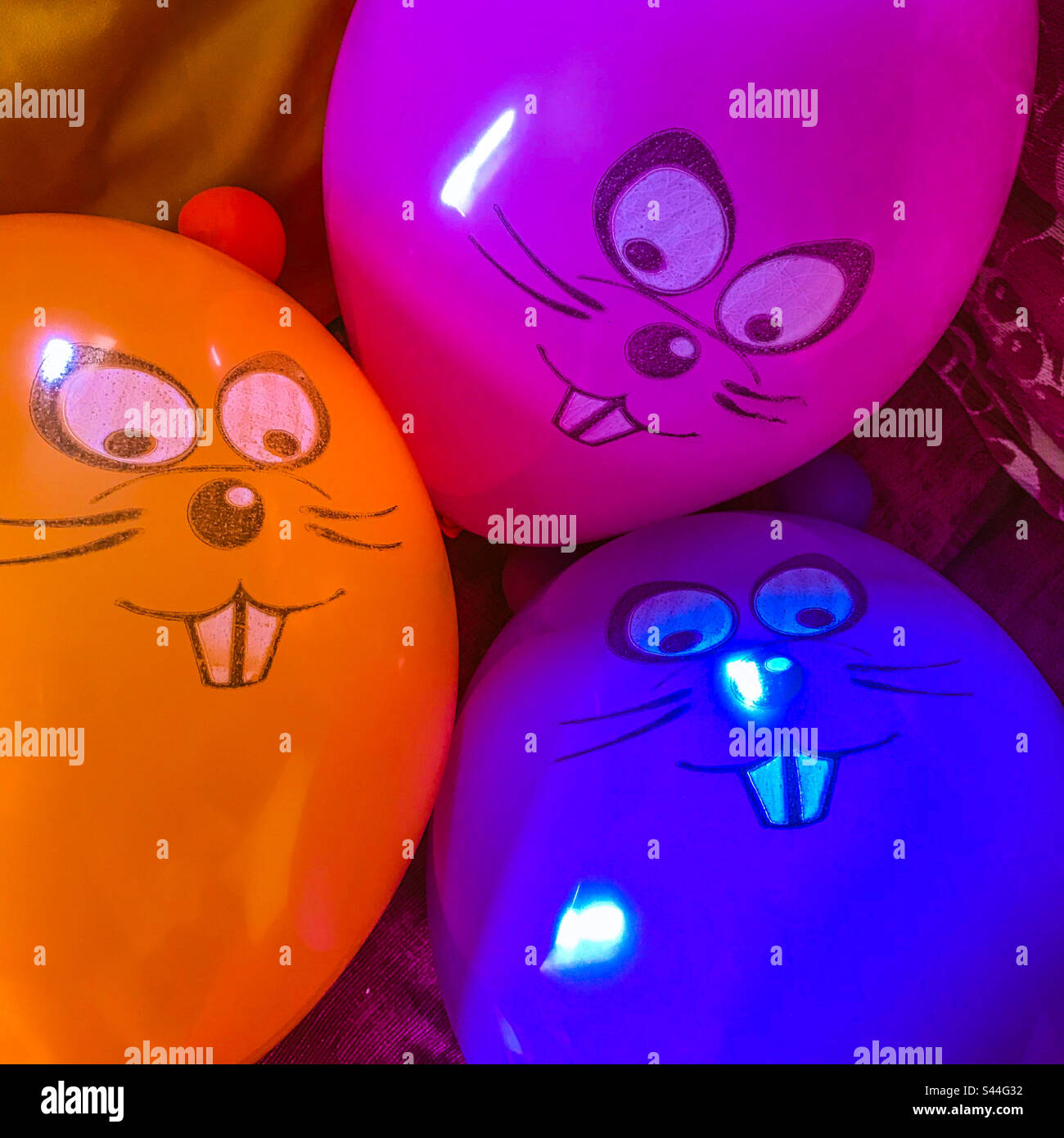 Colourful face balloons Stock Photo - Alamy
