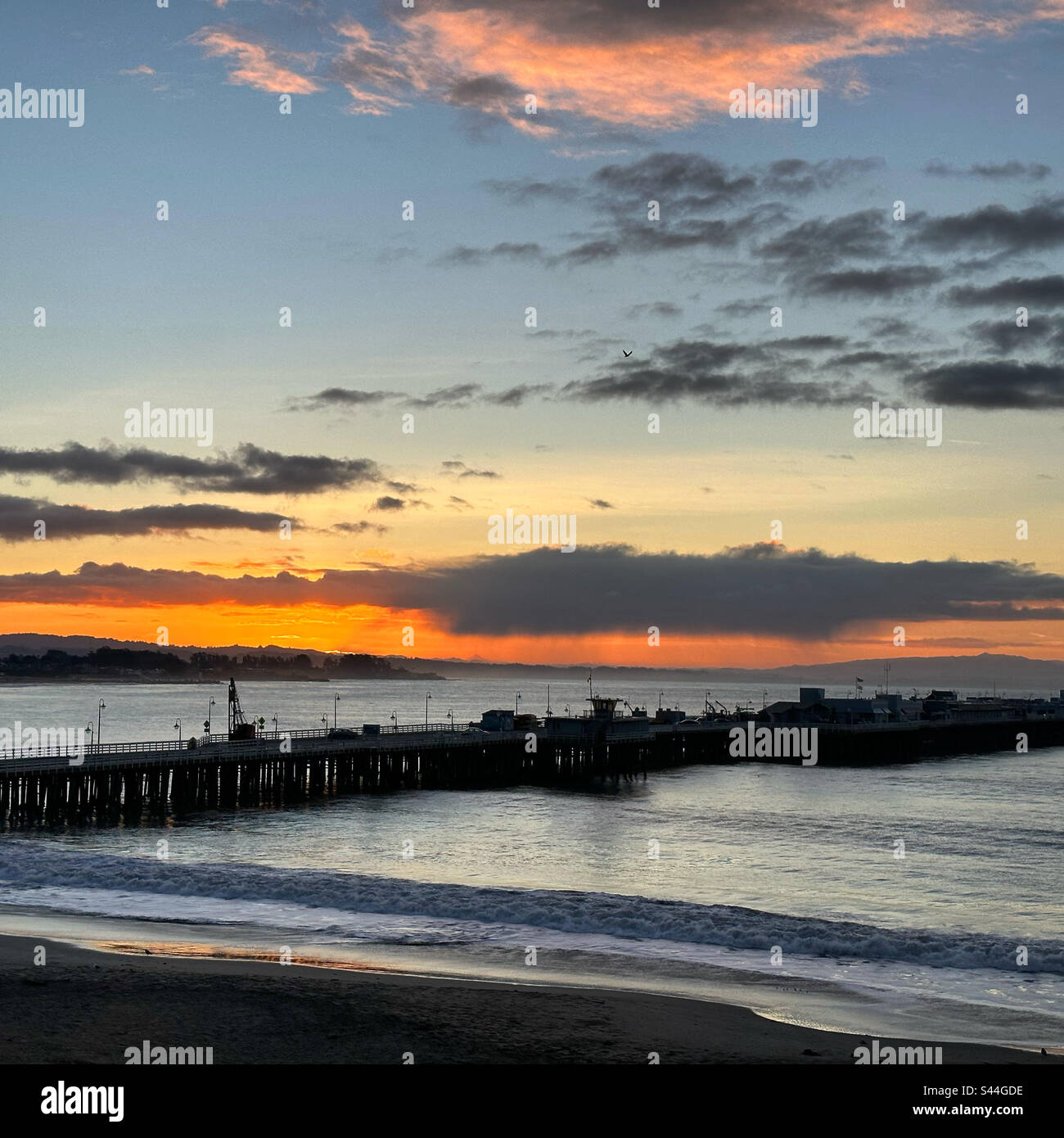 March, 2023, Sunrise over Cowell Beach and Santa Cruz Wharf, Santa Cruz ...