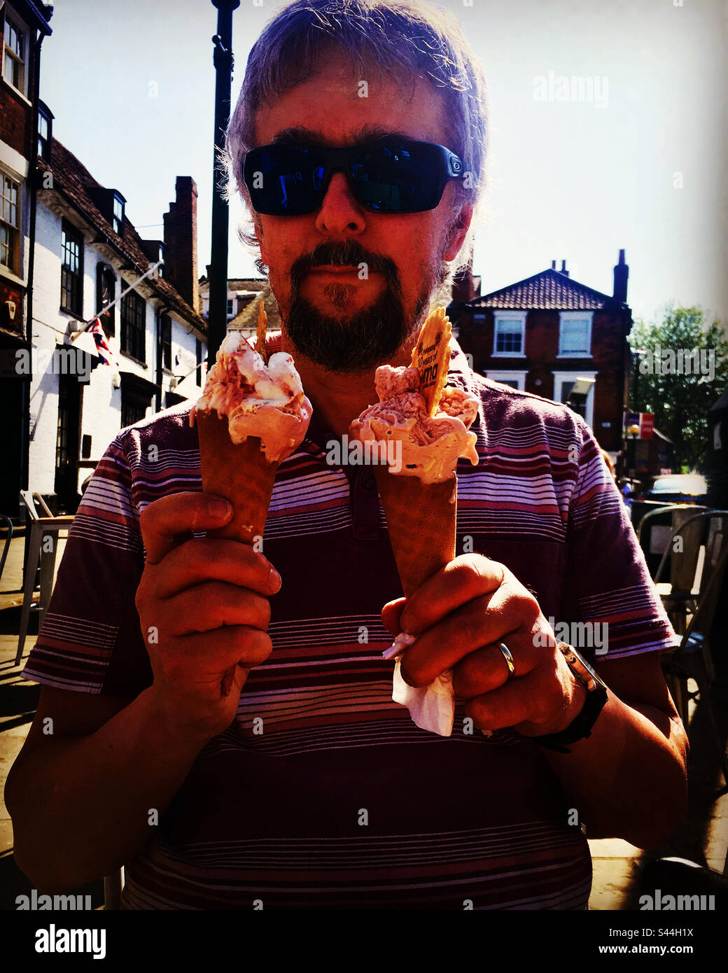 Man in pink hi-res stock photography and images - Alamy