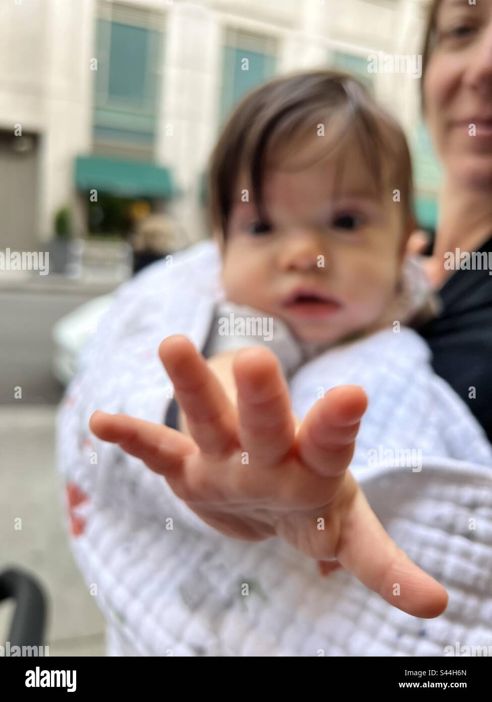 Hand reaching for phone hi-res stock photography and images - Alamy