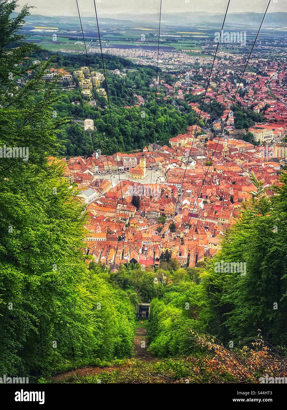 Birds Eye view of Brasov and the cable cars from the top of Mount Tampa ...