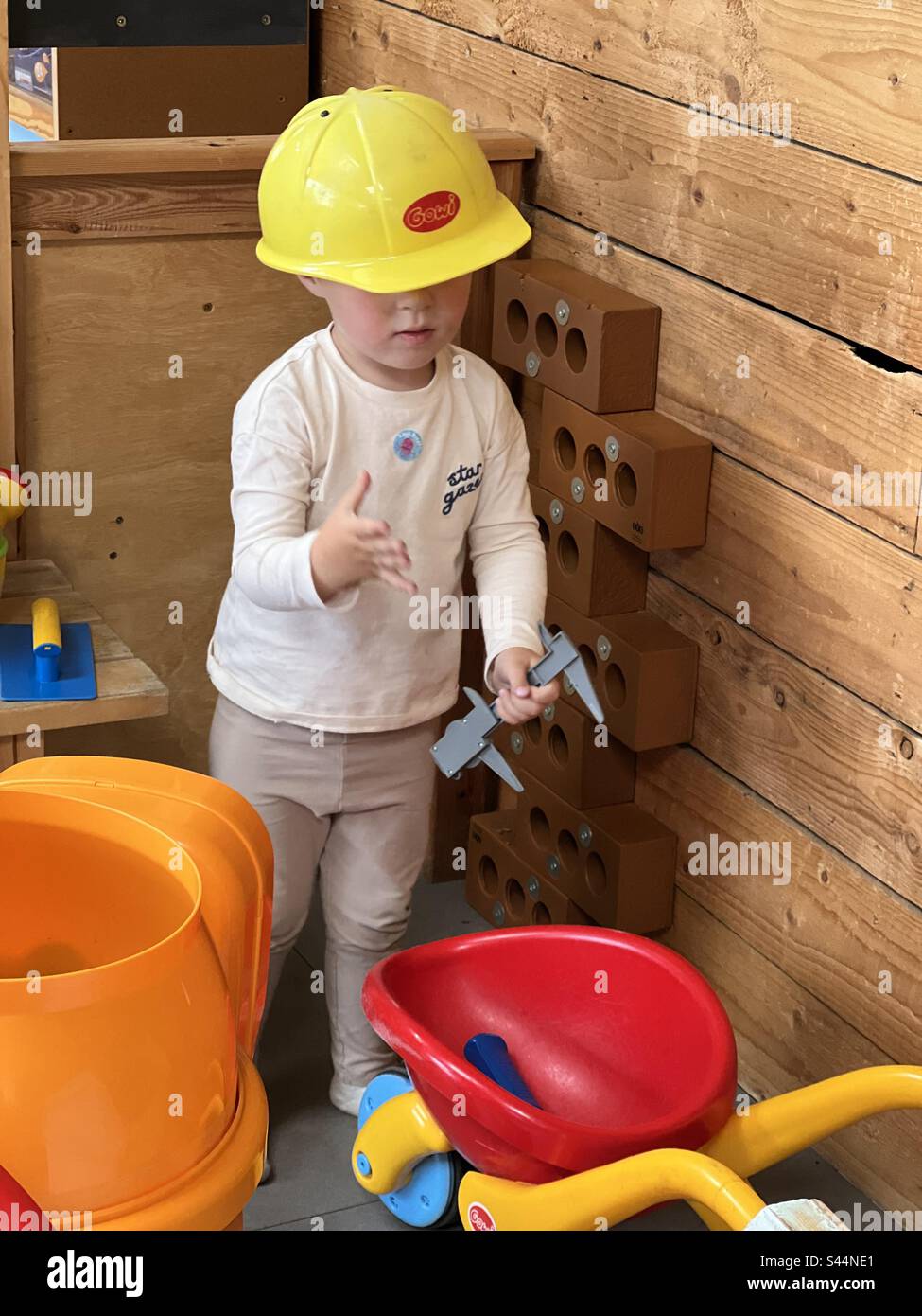 Educational - young boy giving instructions on a building site Stock ...