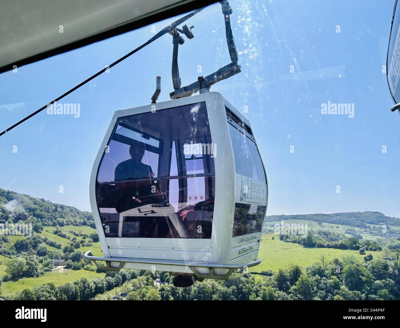 Heights of Abraham cable car with person in over Matlock Stock Photo ...