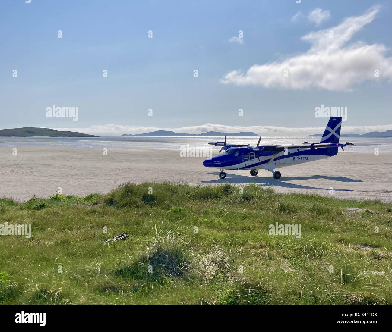 Plane landed on Barra beach Stock Photo - Alamy