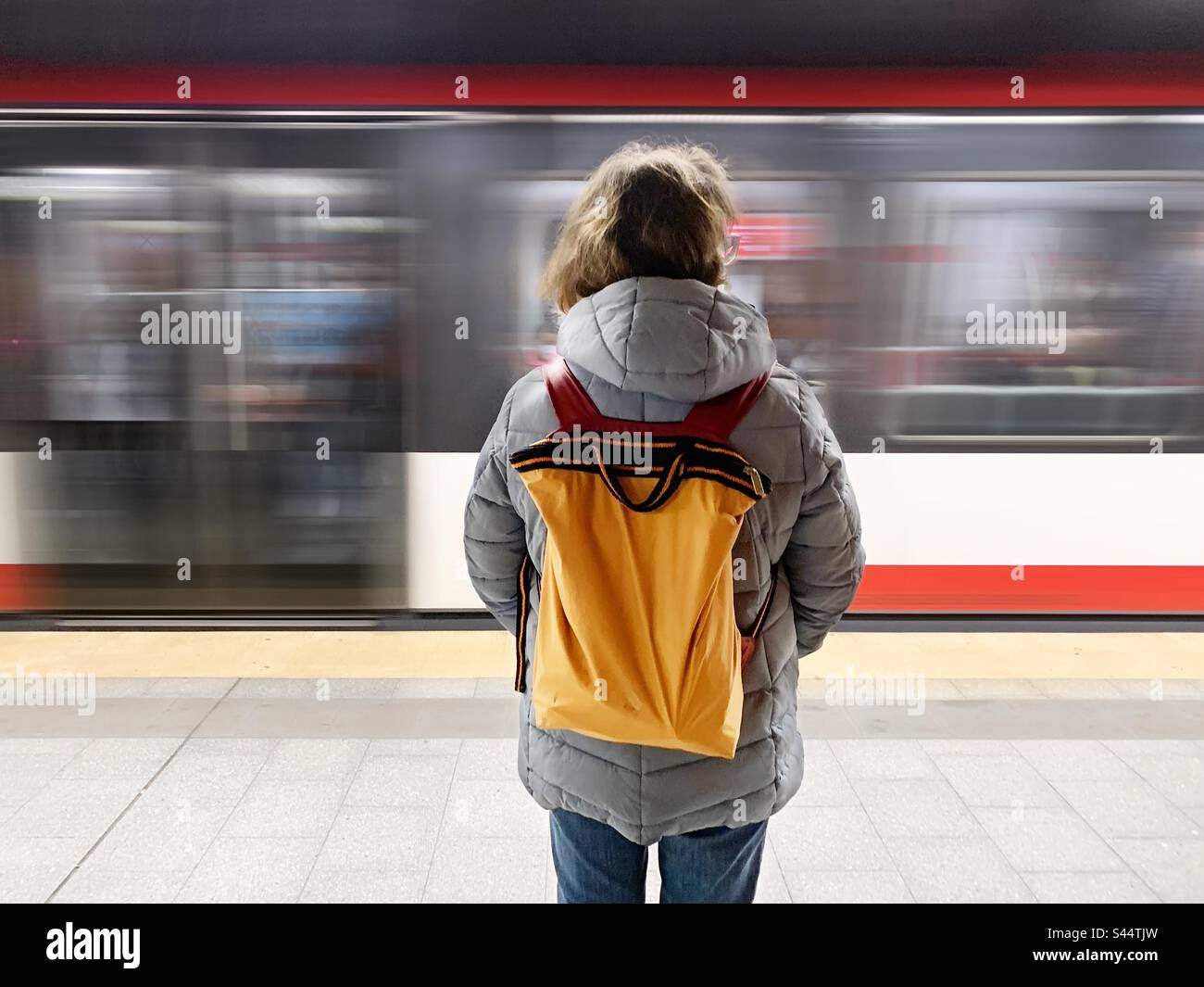 Yellow backpack hi-res stock photography and images - Alamy