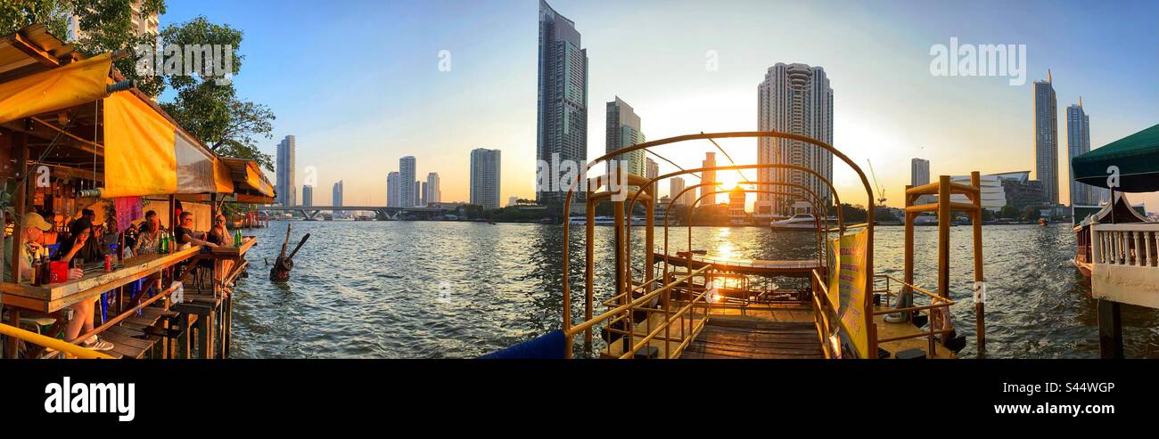 Chao Phraya River views for riverside bar - Jacks bar at sunset in ...