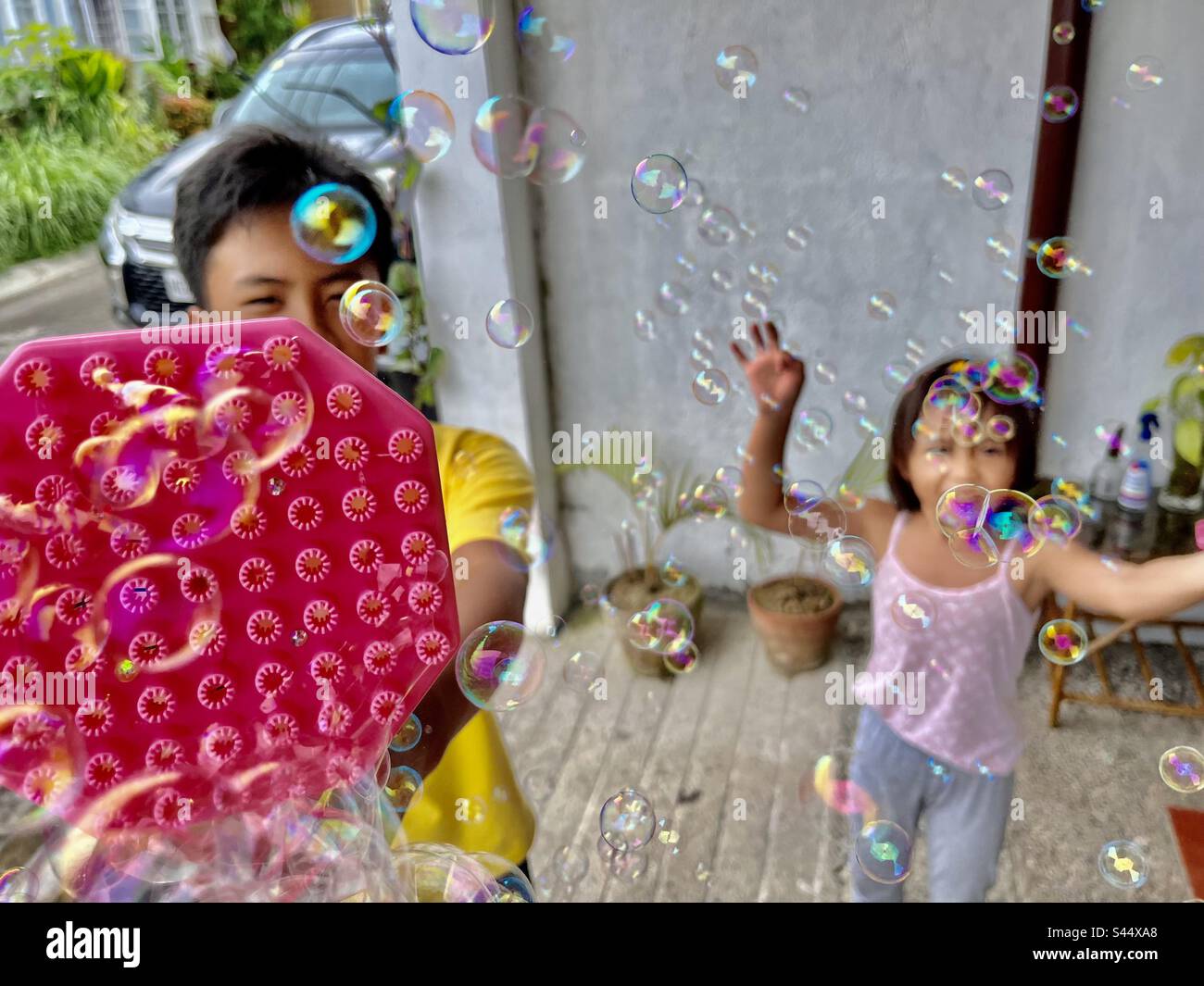 Children bubbles fun hi-res stock photography and images - Alamy