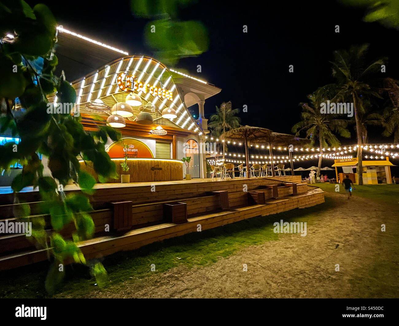 Beach bar at night Stock Photo - Alamy