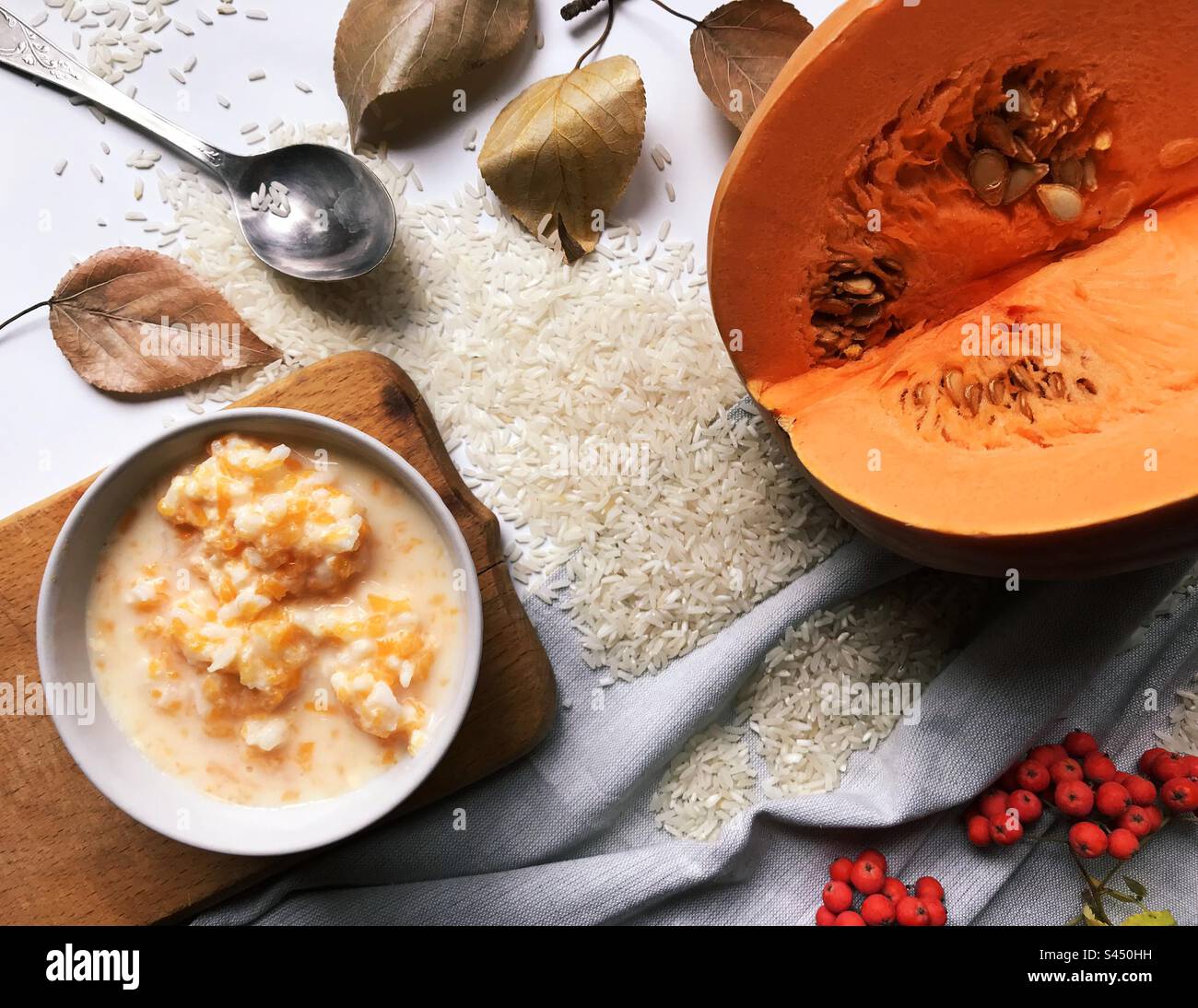 Rice porridge with pumpkin autumn food Stock Photo - Alamy