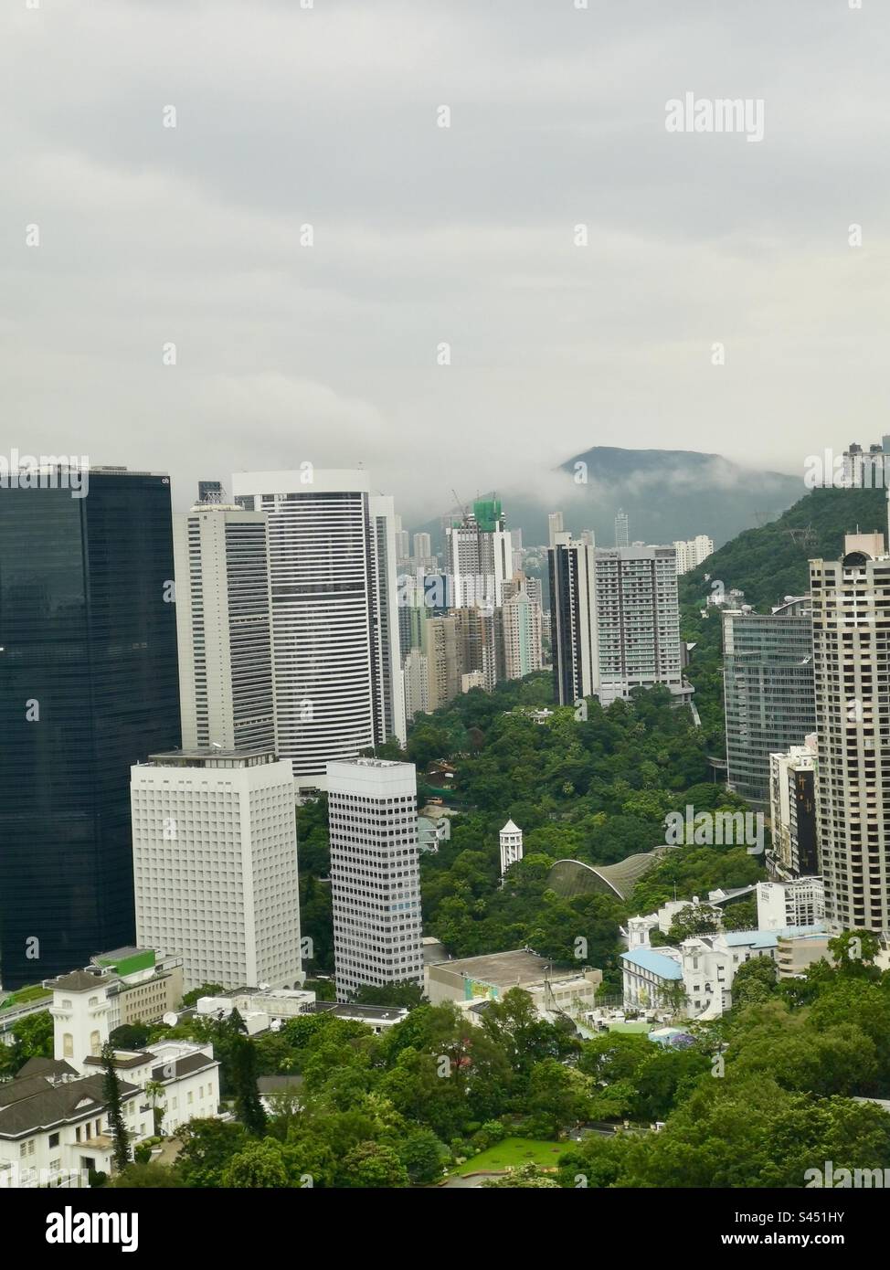 A view of the Hong Kong park between the modern buildings Stock Photo ...