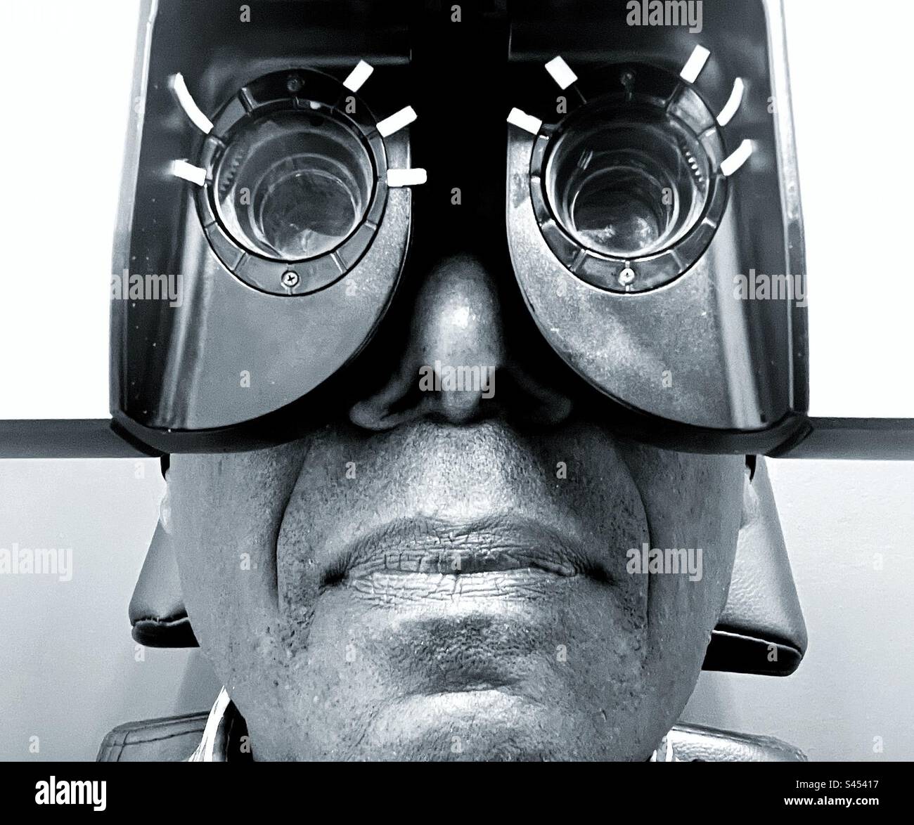 Black male having an eye test Stock Photo - Alamy