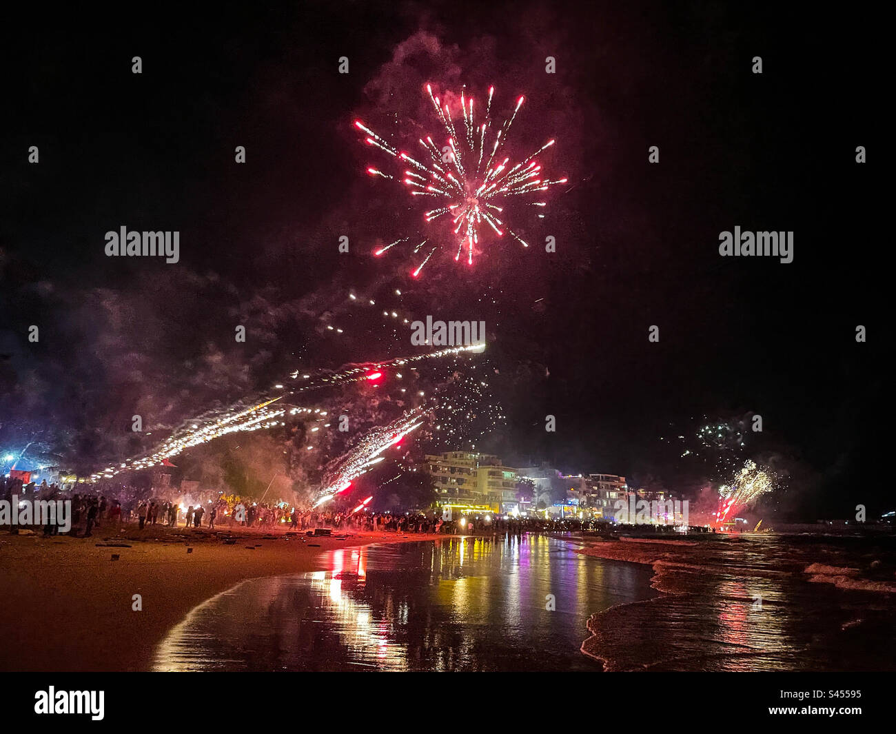 Fireworks on a beach Stock Photo - Alamy
