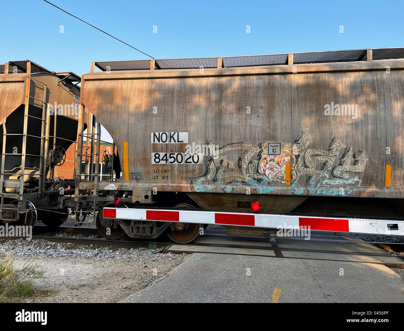 Train car passing at bike path, Madison, WI Stock Photo - Alamy