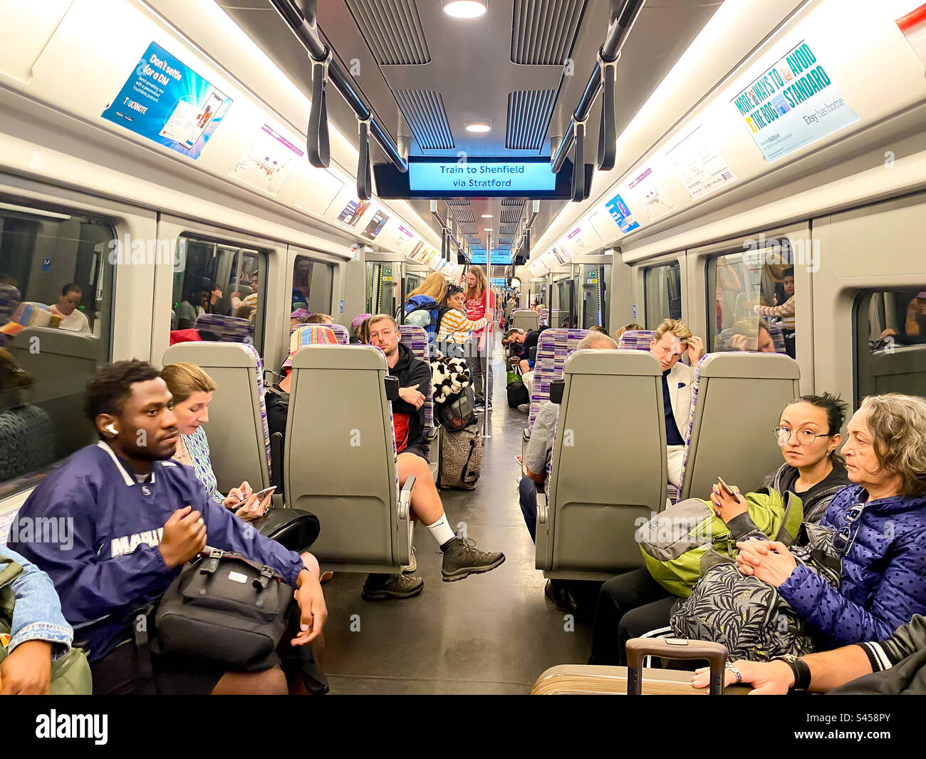View onboard an Elizabeth Line London Underground train, looking along ...