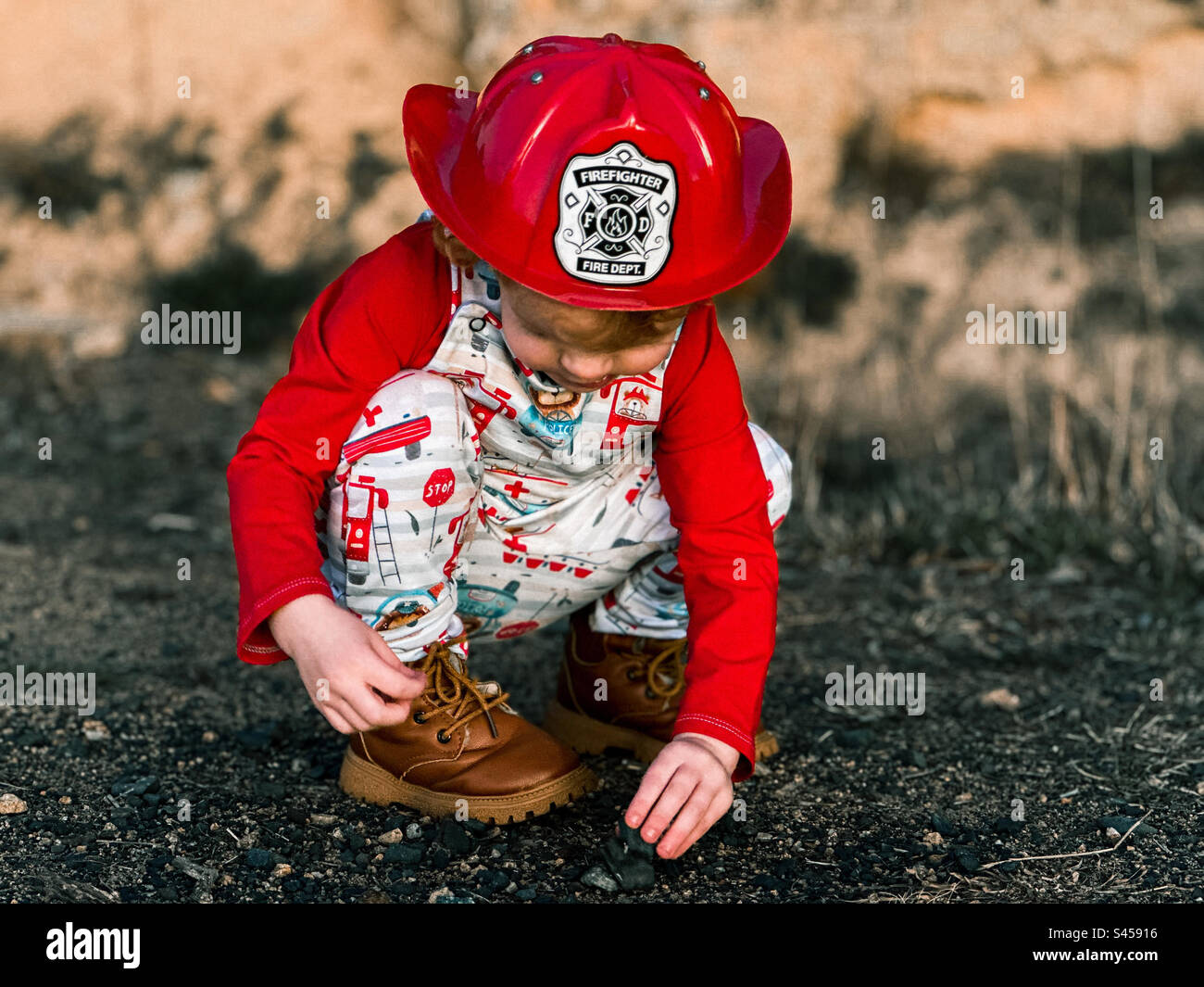 Child fireman hi-res stock photography and images - Alamy