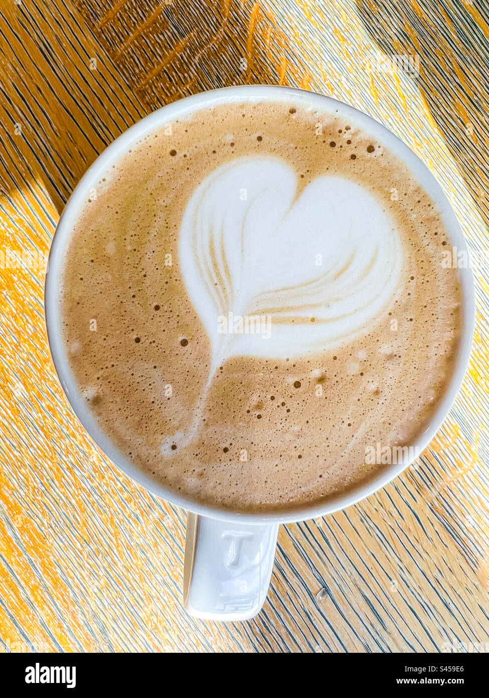Mug of latte with love art Stock Photo - Alamy
