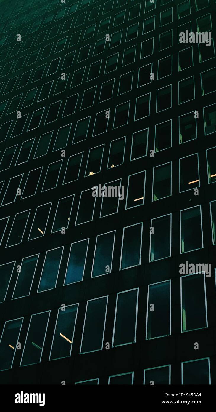 Tower block windows at night Stock Photo - Alamy