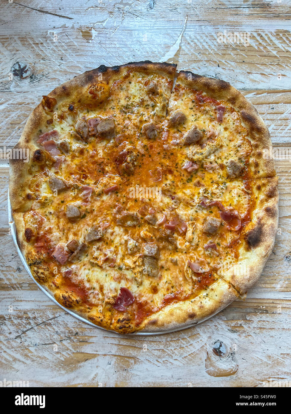 Cheese ham and chicken pizza Stock Photo - Alamy