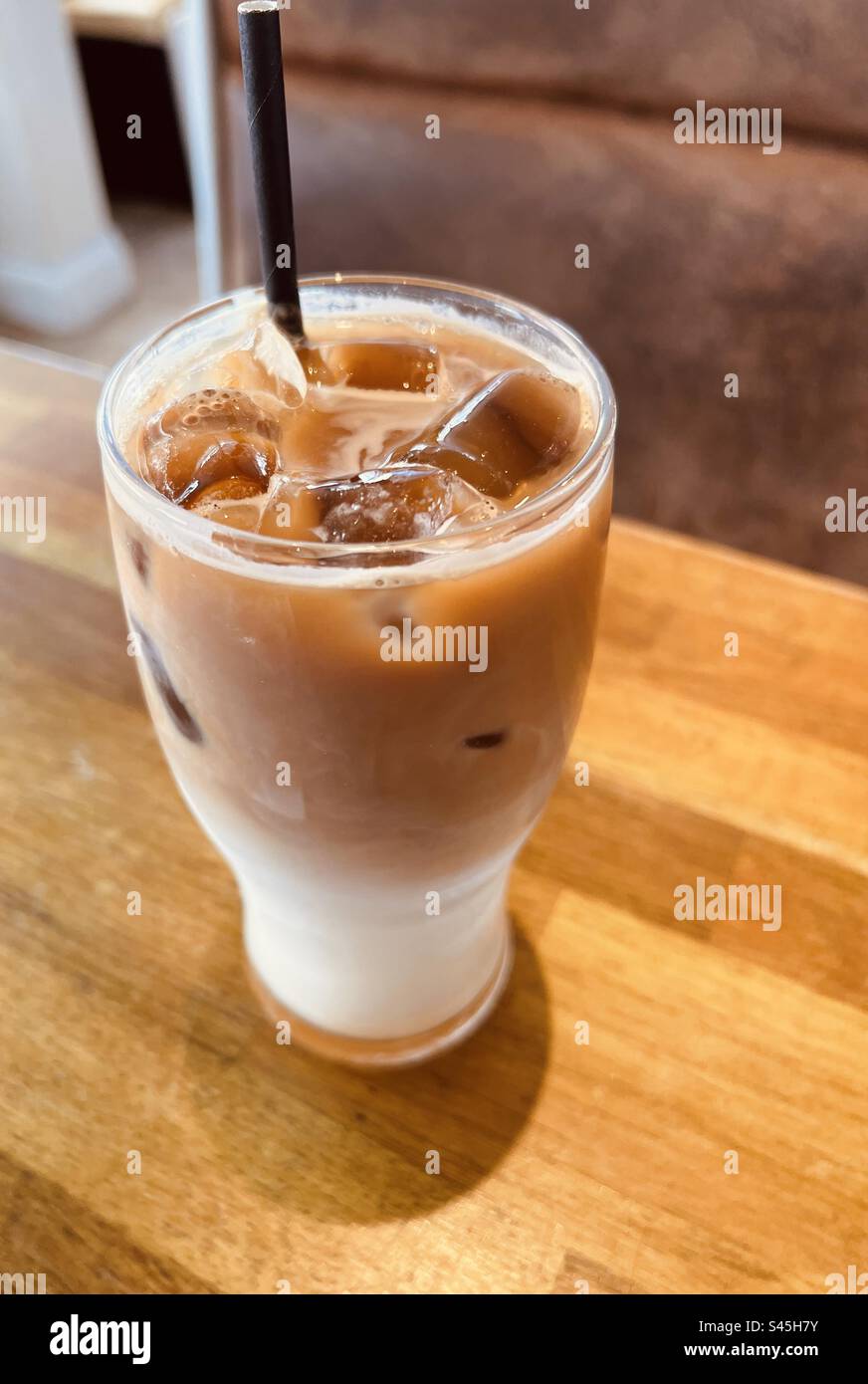 Iced coffee with straw Stock Photo - Alamy
