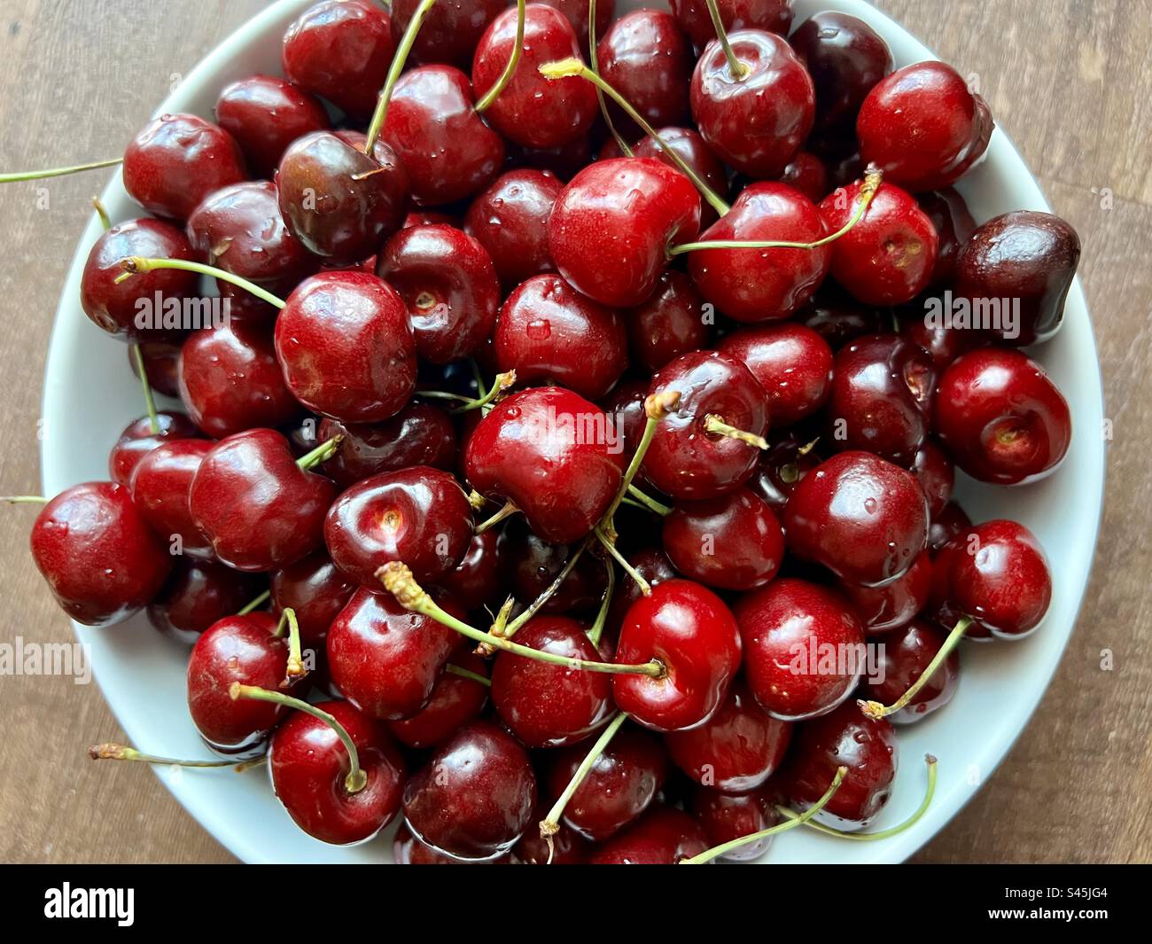 Cherries top view smartphone stock photos and images - Alamy