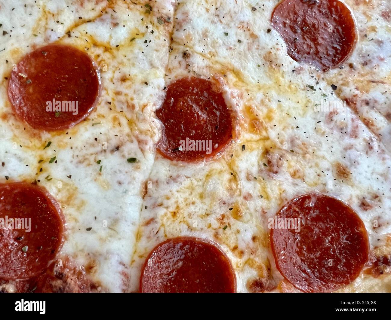 Pepperoni pizza filling a horizontal frame Stock Photo - Alamy
