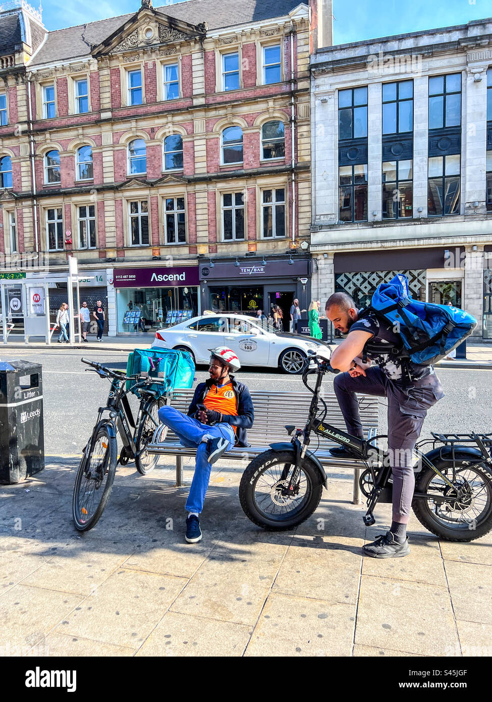 Just eat delivery drivers having a break Stock Photo - Alamy