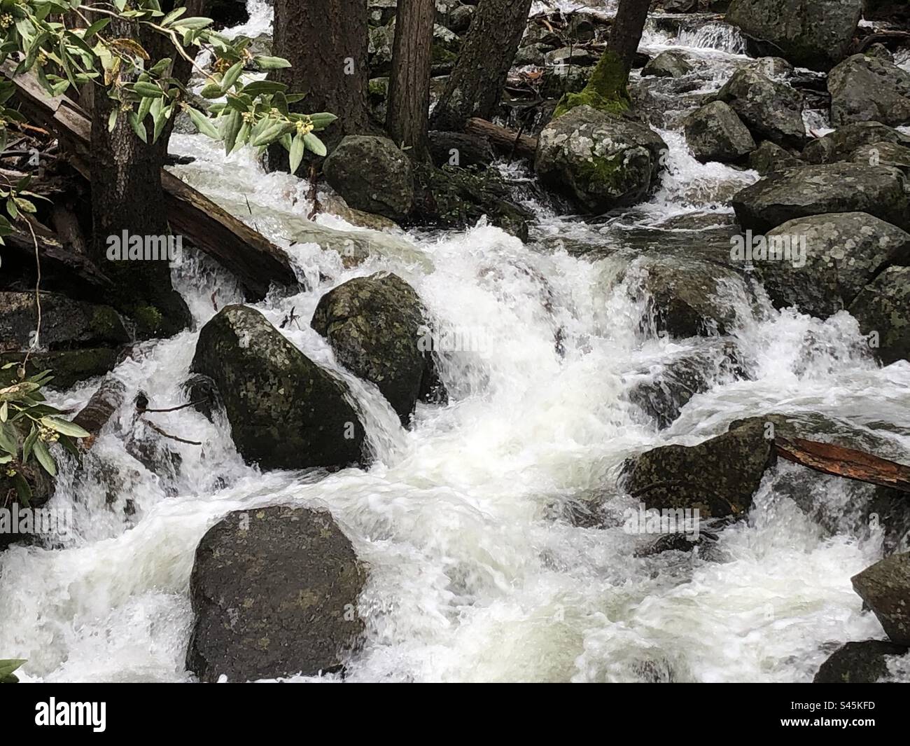 Water slipping trough the rocks Stock Photo - Alamy