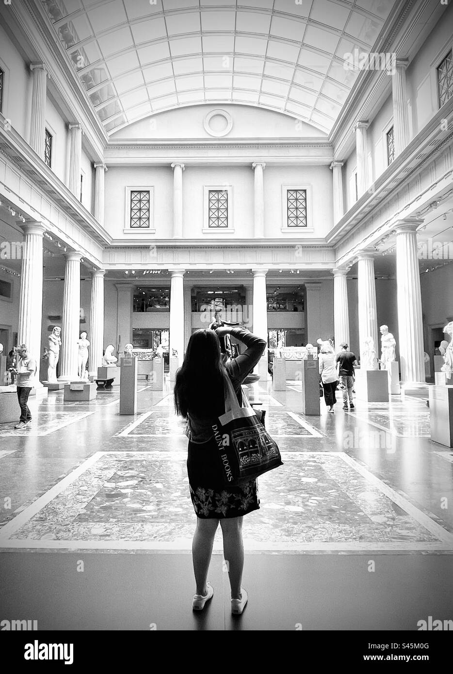 Photographer in museum Stock Photo - Alamy