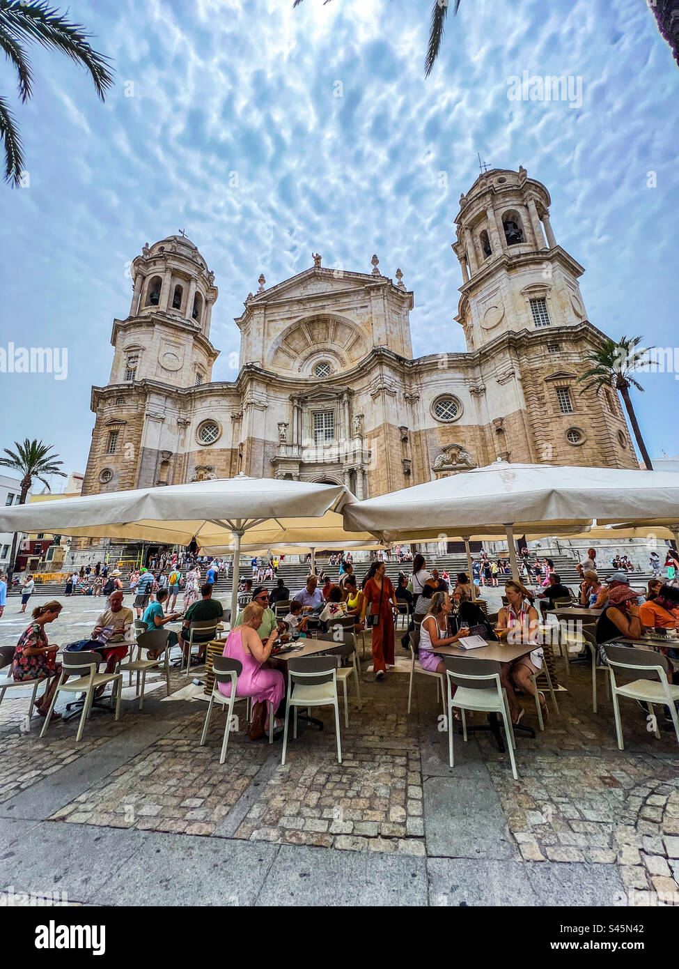 Cafes outside Cádiz cathedral in south western Spain Stock Photo - Alamy