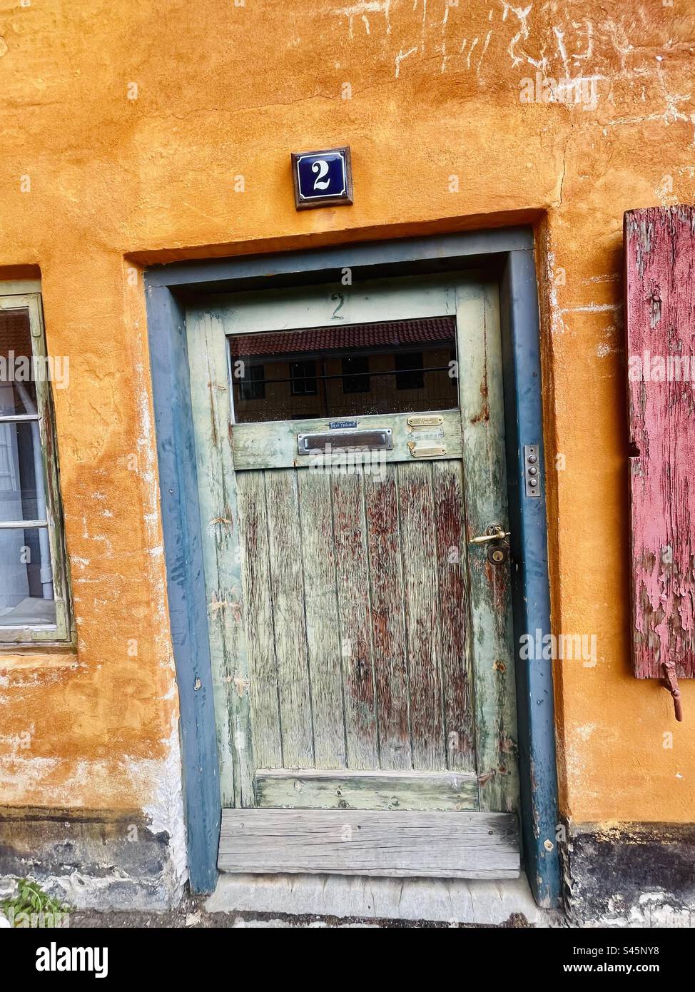 The colorful Nyboder neighborhood in Copenhagen, Denmark Stock Photo ...