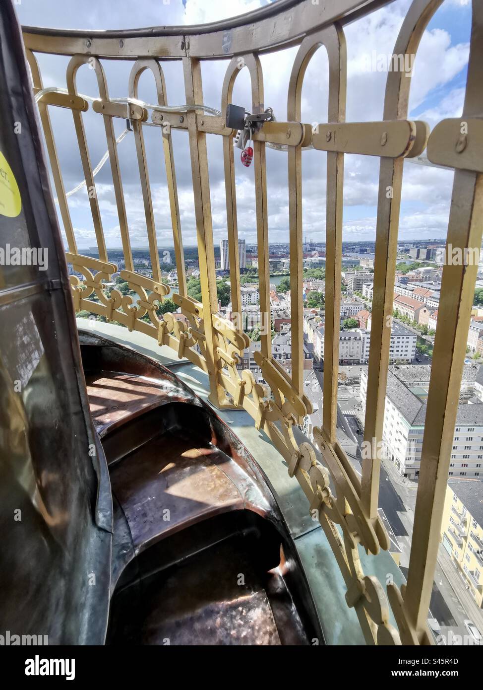 Climbing the last steps of the spiral staircase of Church of Our ...